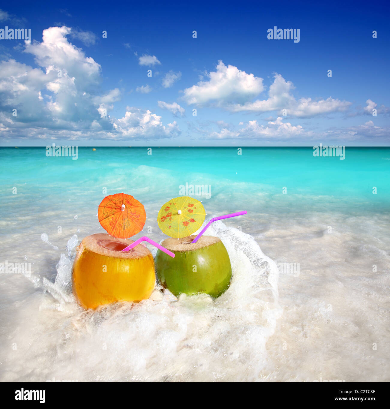 coconut cocktails juice in tropical beach water splash turquoise ...