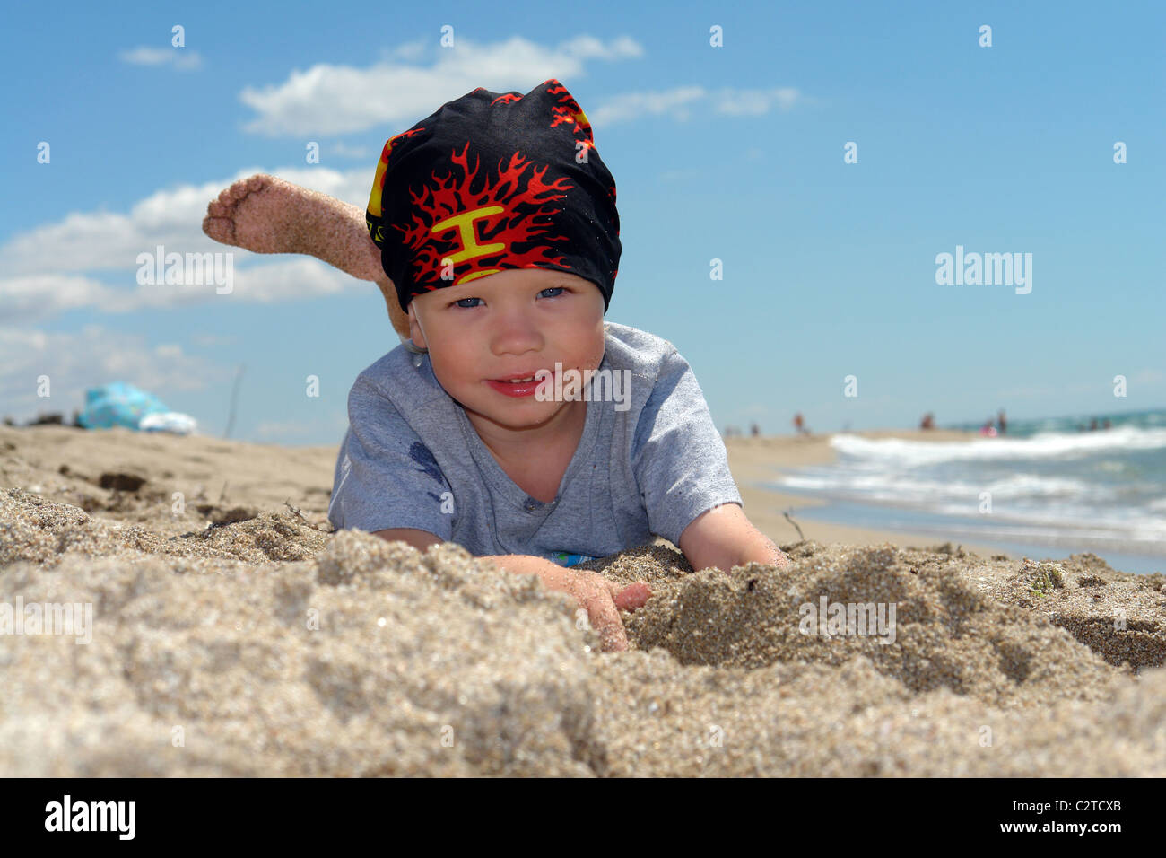 child on beach Stock Photo - Alamy