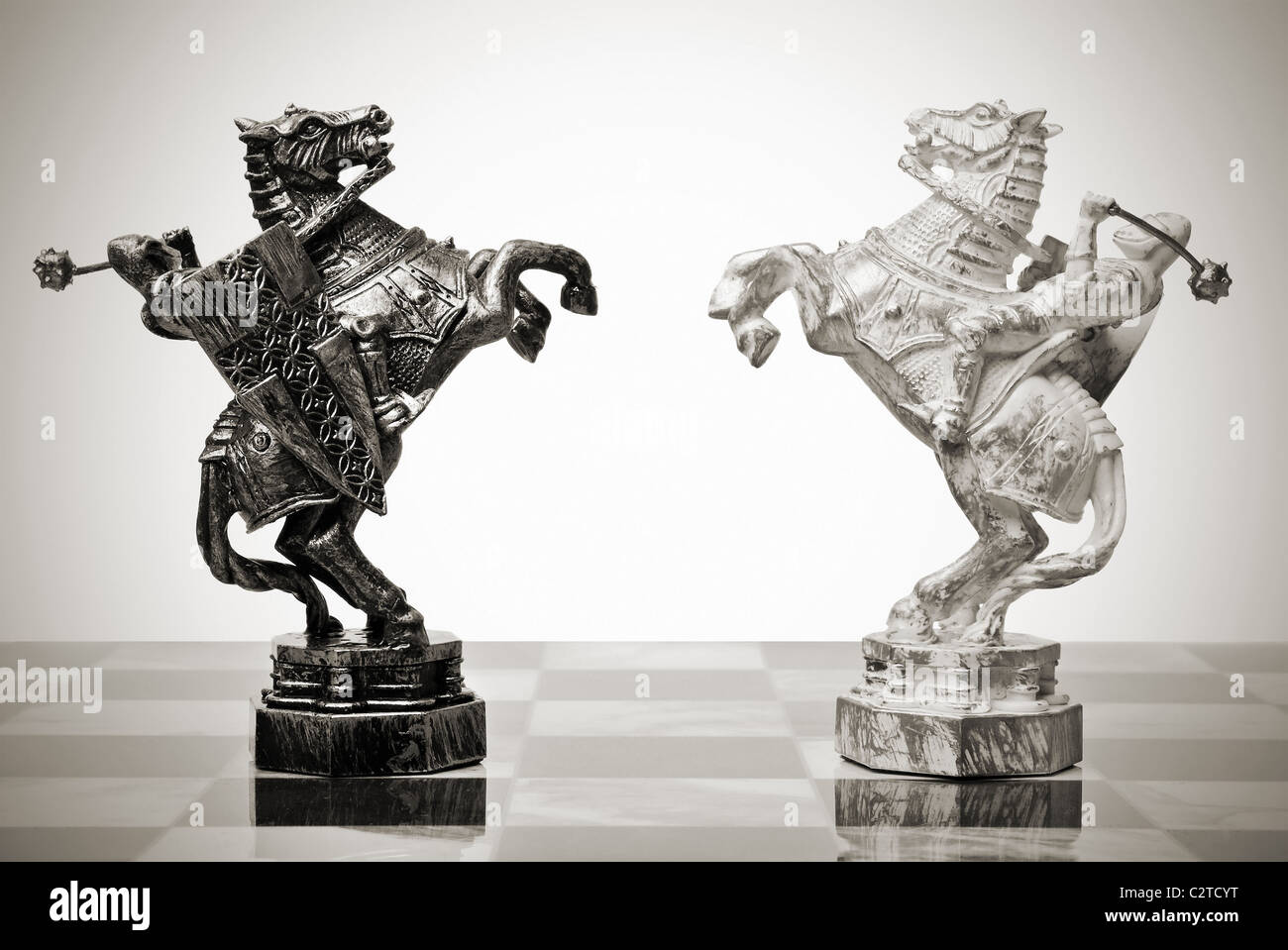 battle knights on horseback. chess pieces Stock Photo - Alamy