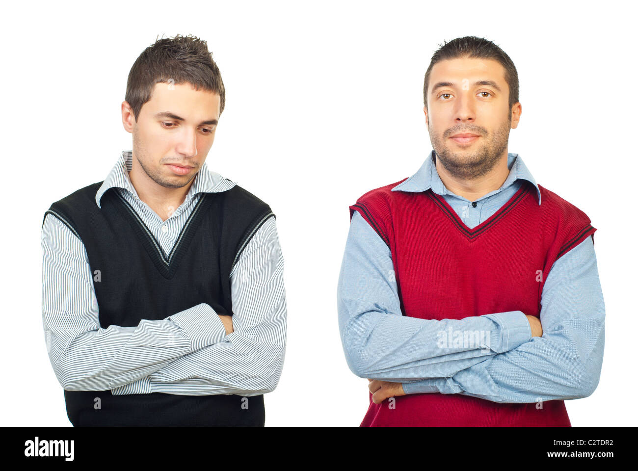 Sorrowful two men standing with arms folded and thinking isolated on ...
