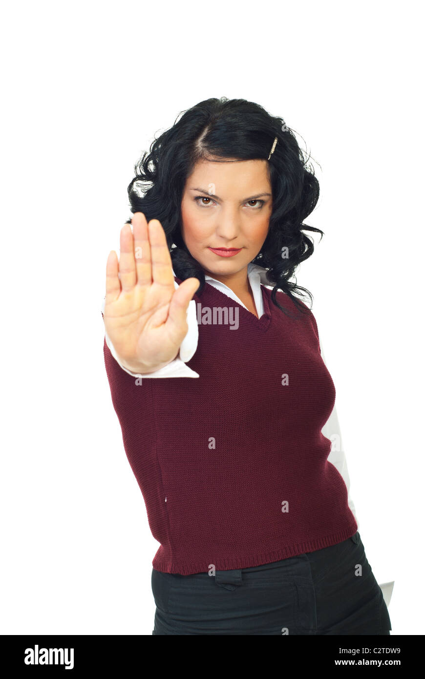 Beautiful serious woman with hand stop gesture isolated on white ...