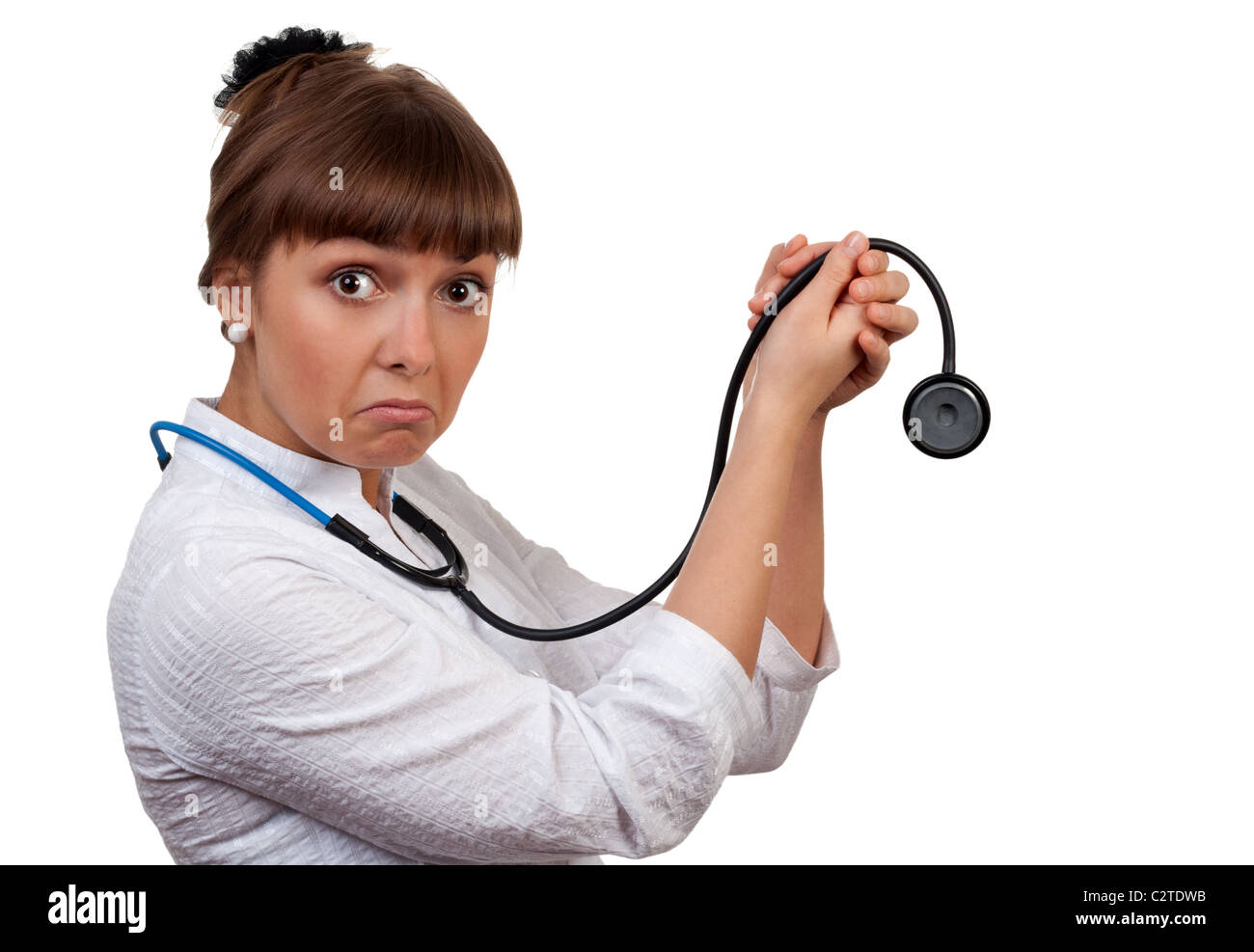 beautiful young woman doctor with a stethoscope sings on a white ...