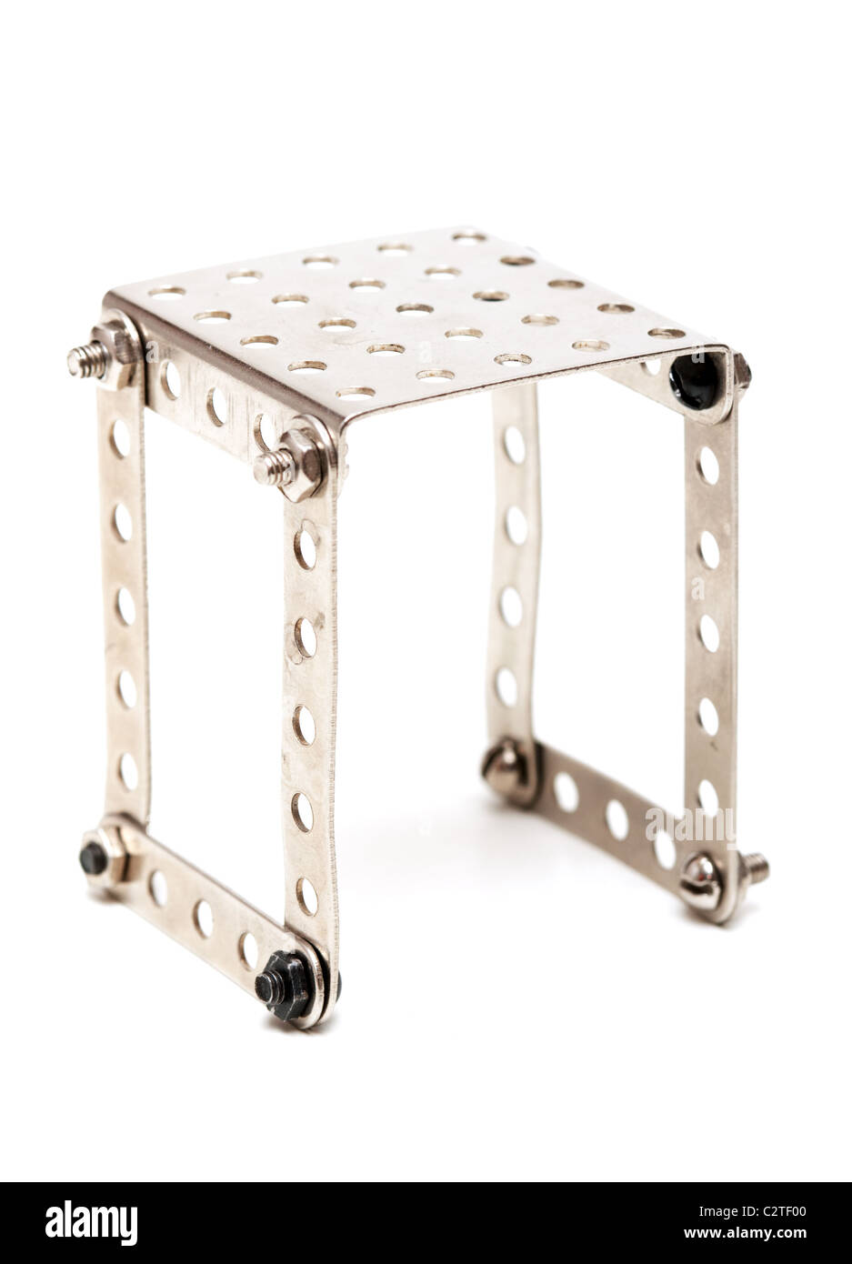 Steel building kit with bolts and nuts on white background Stock Photo ...