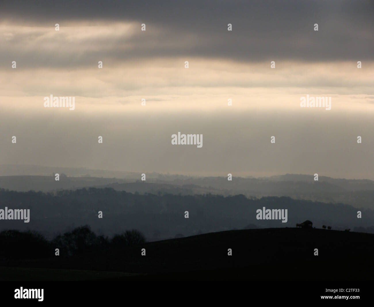layered hills over cast by cloud Stock Photo - Alamy