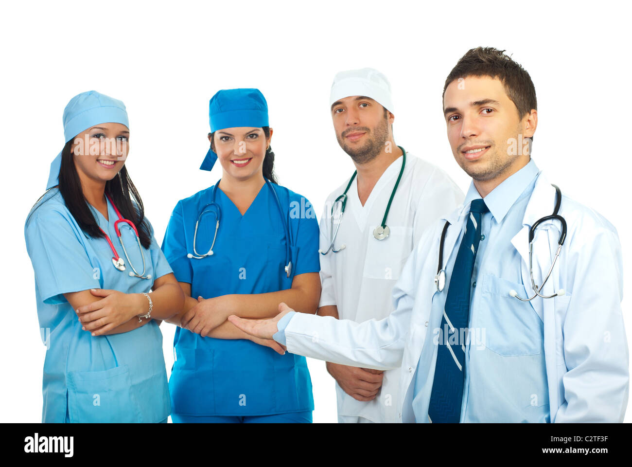 Smiling doctors presenting his happy team of doctors isolated on white ...