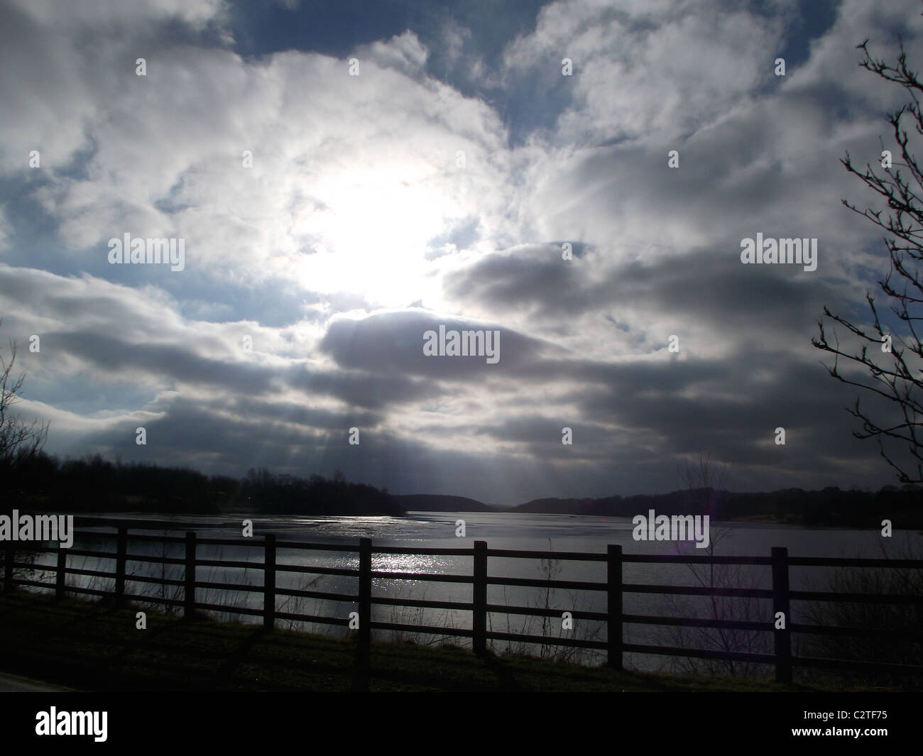 troubled sky over lake Stock Photo - Alamy