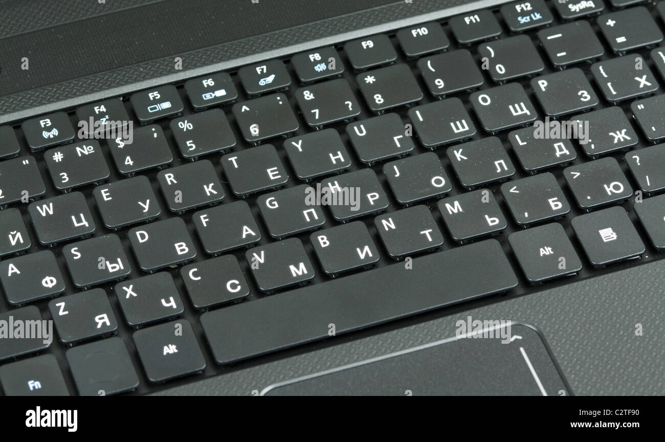black laptop keyboard in Latin and Russian characters Stock Photo - Alamy