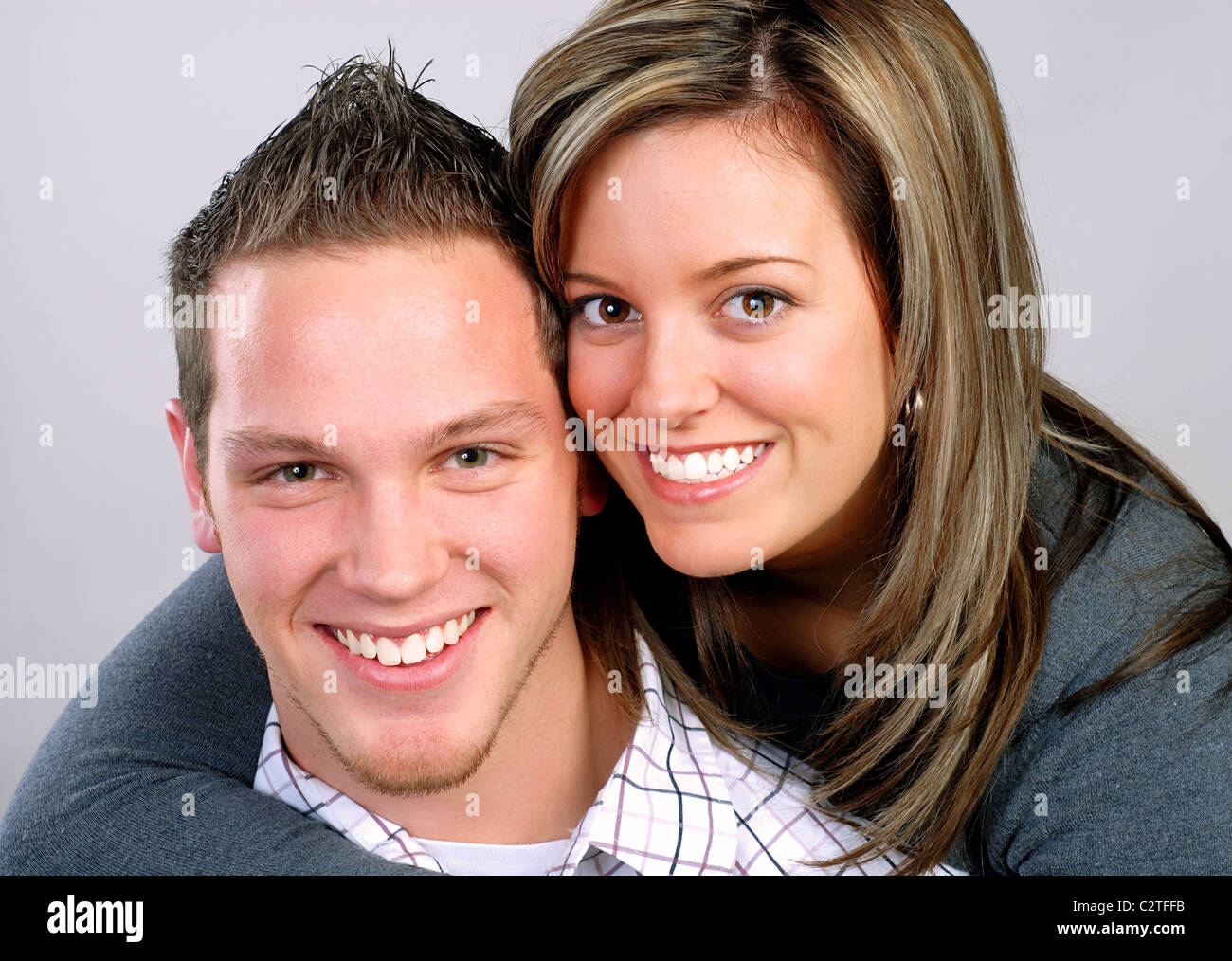 Young Engaged Couple Being Close To Each Other Stock Photo - Alamy