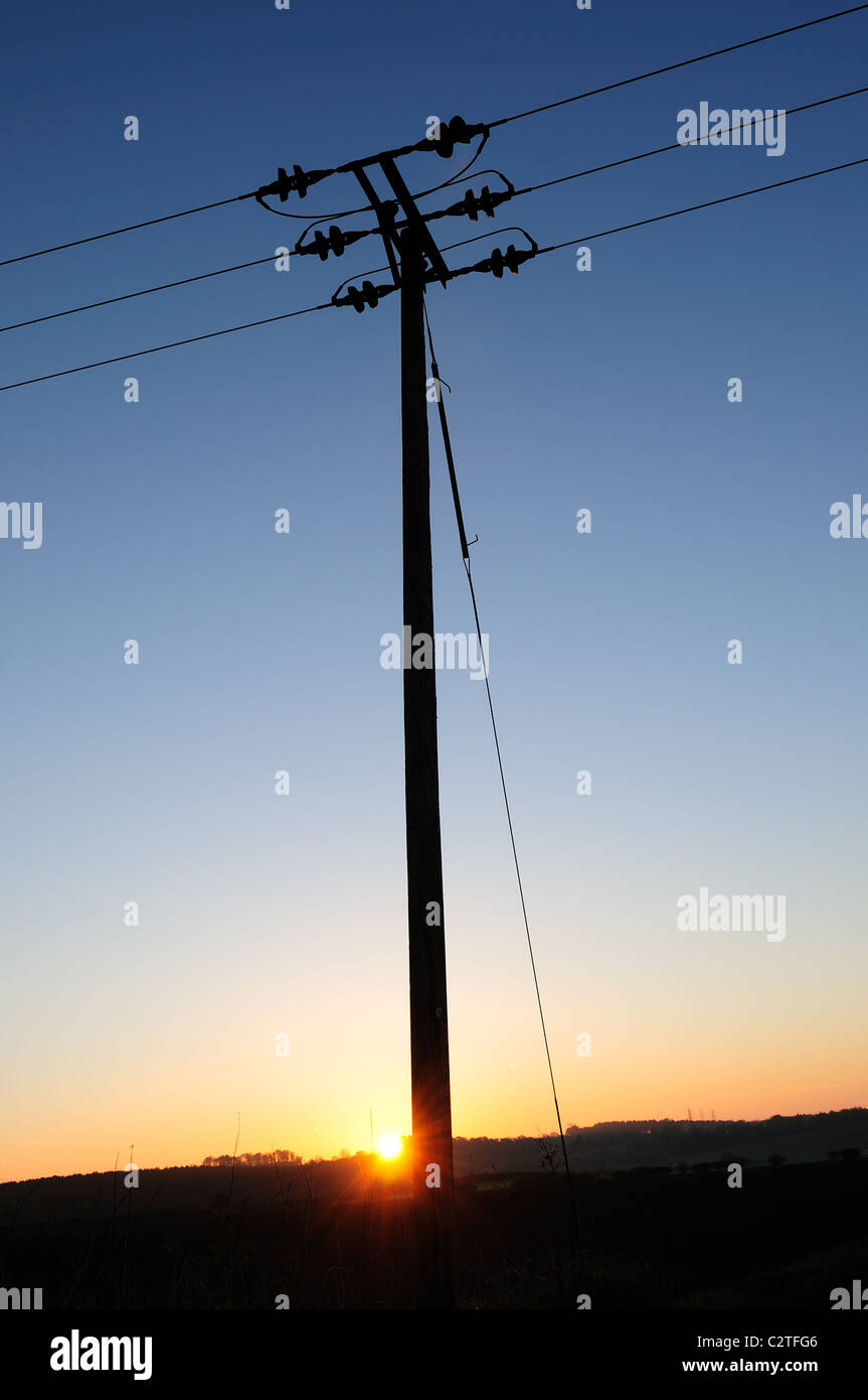 Electric Power Cables at Sunrise Stock Photo - Alamy