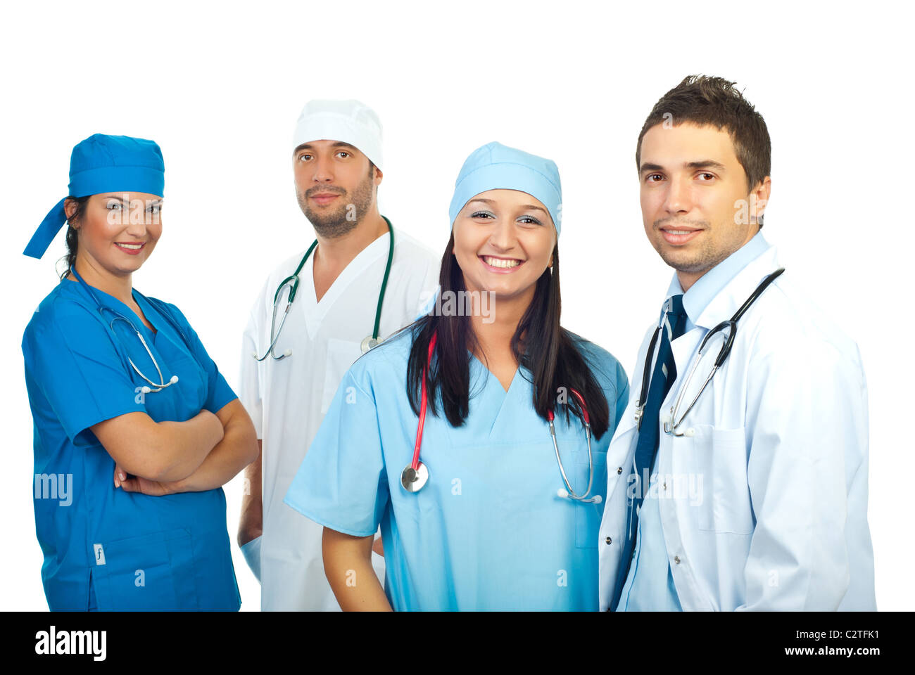 Friendly smiling young team of doctors isolated on white background ...