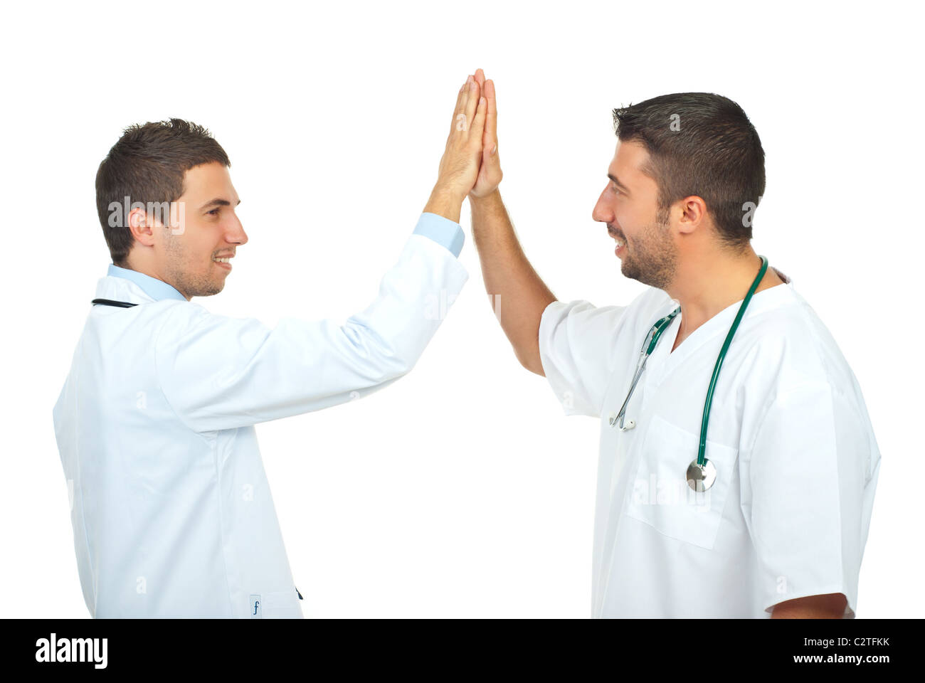 Two doctors men giving high five isolated on white background Stock ...