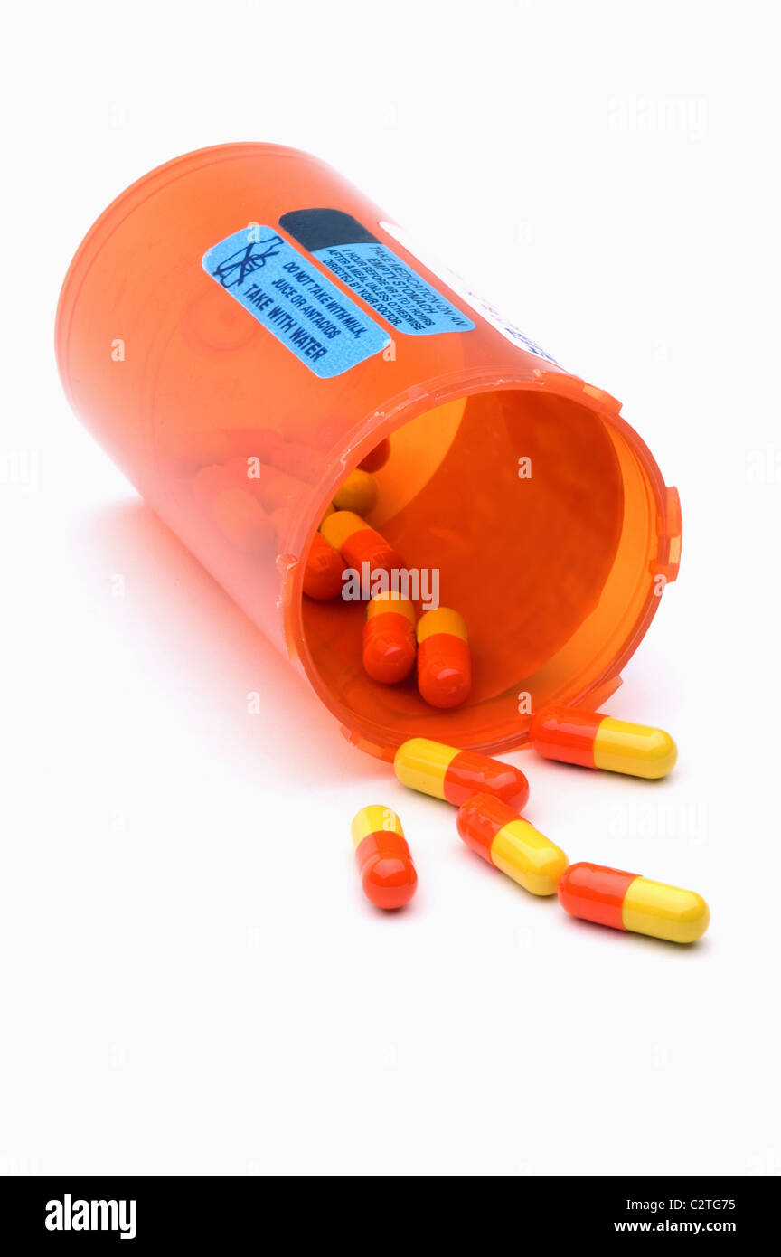 Prescription Bottle Of Medication Spilling Out On A White Background ...