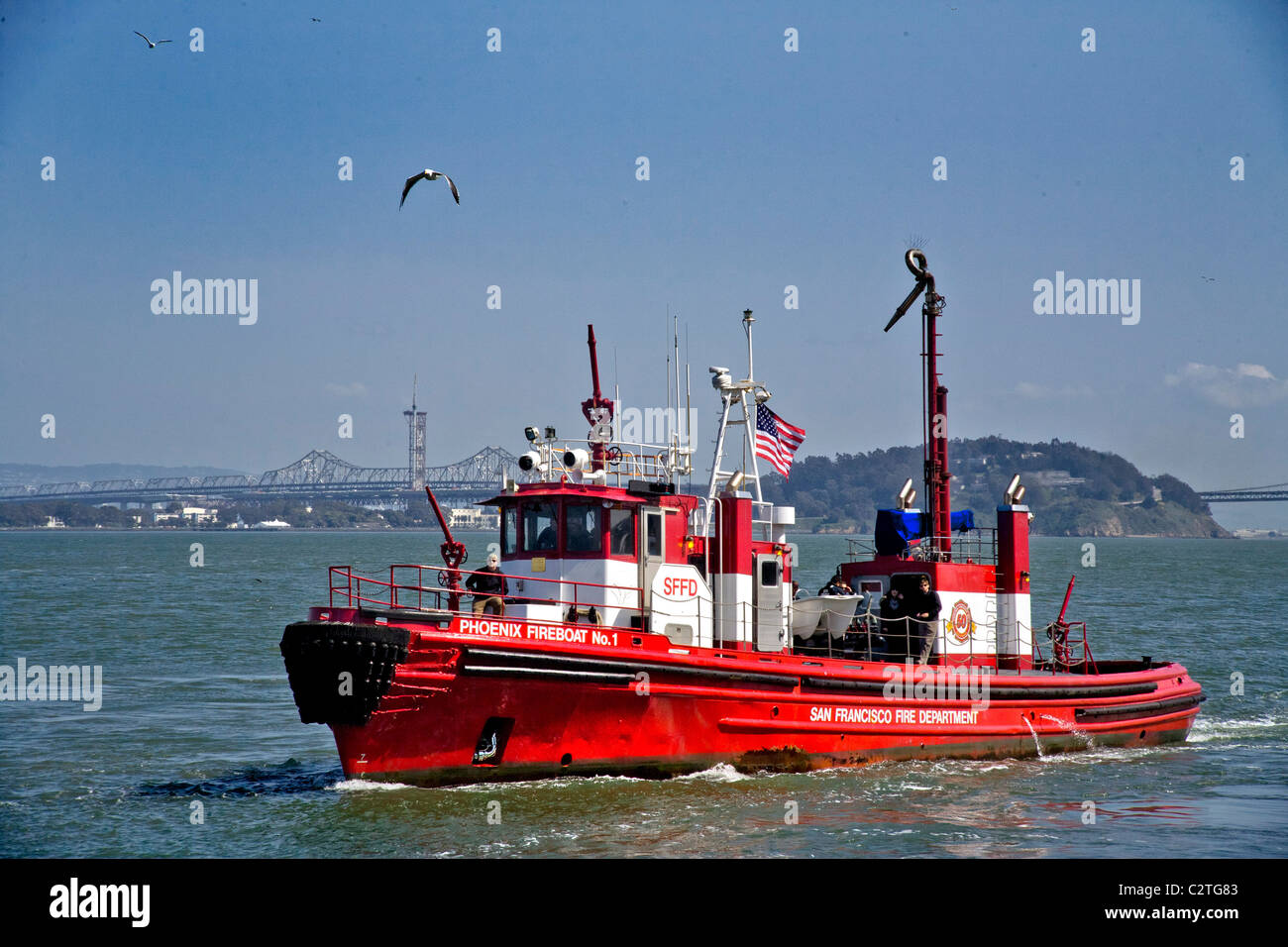 A San Francisco city fire department fire boat crosses San Francisco ...