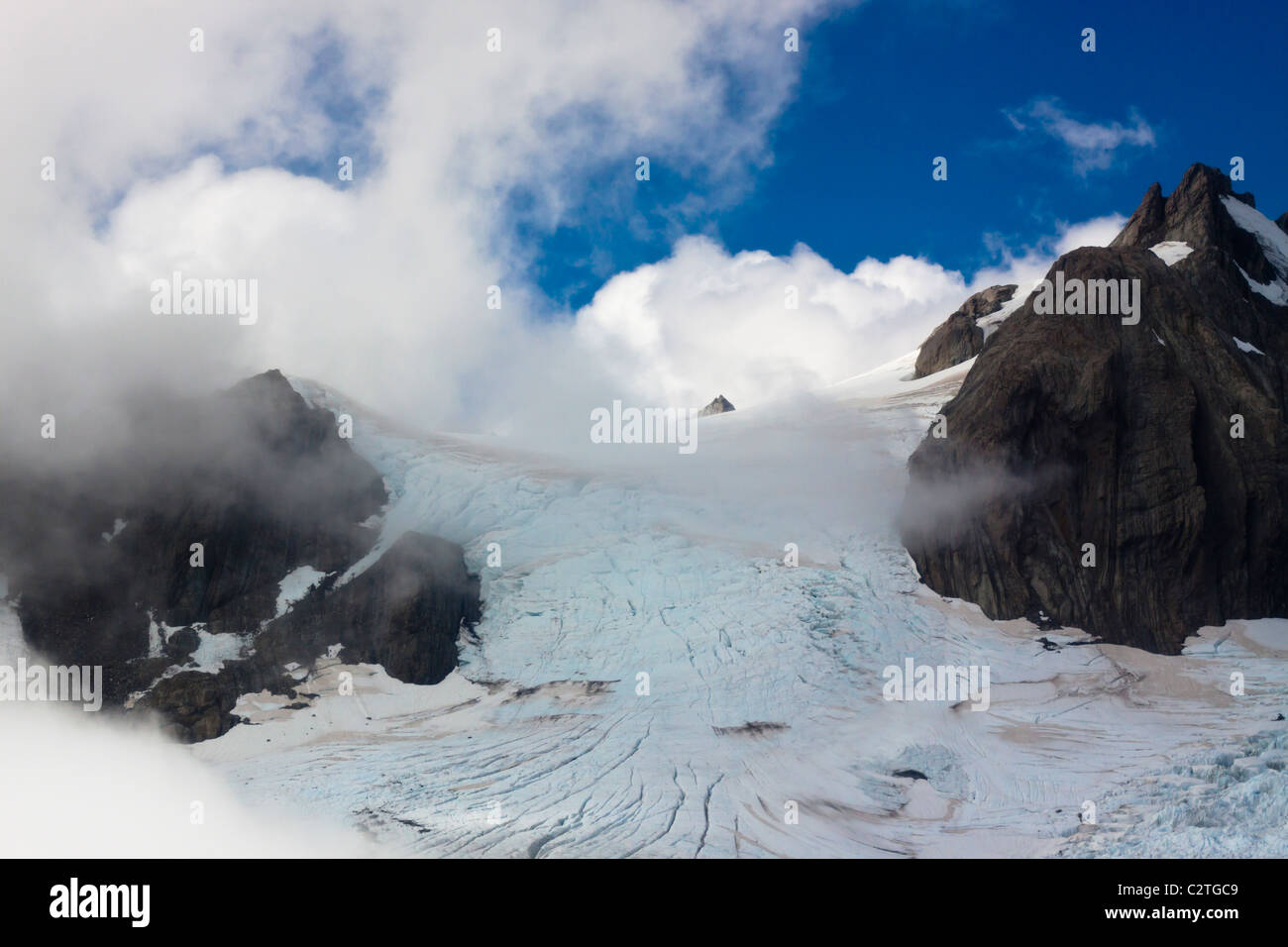 Aerial photo of Mount Cook and cloudscape. Southern Alps, West Coast ...