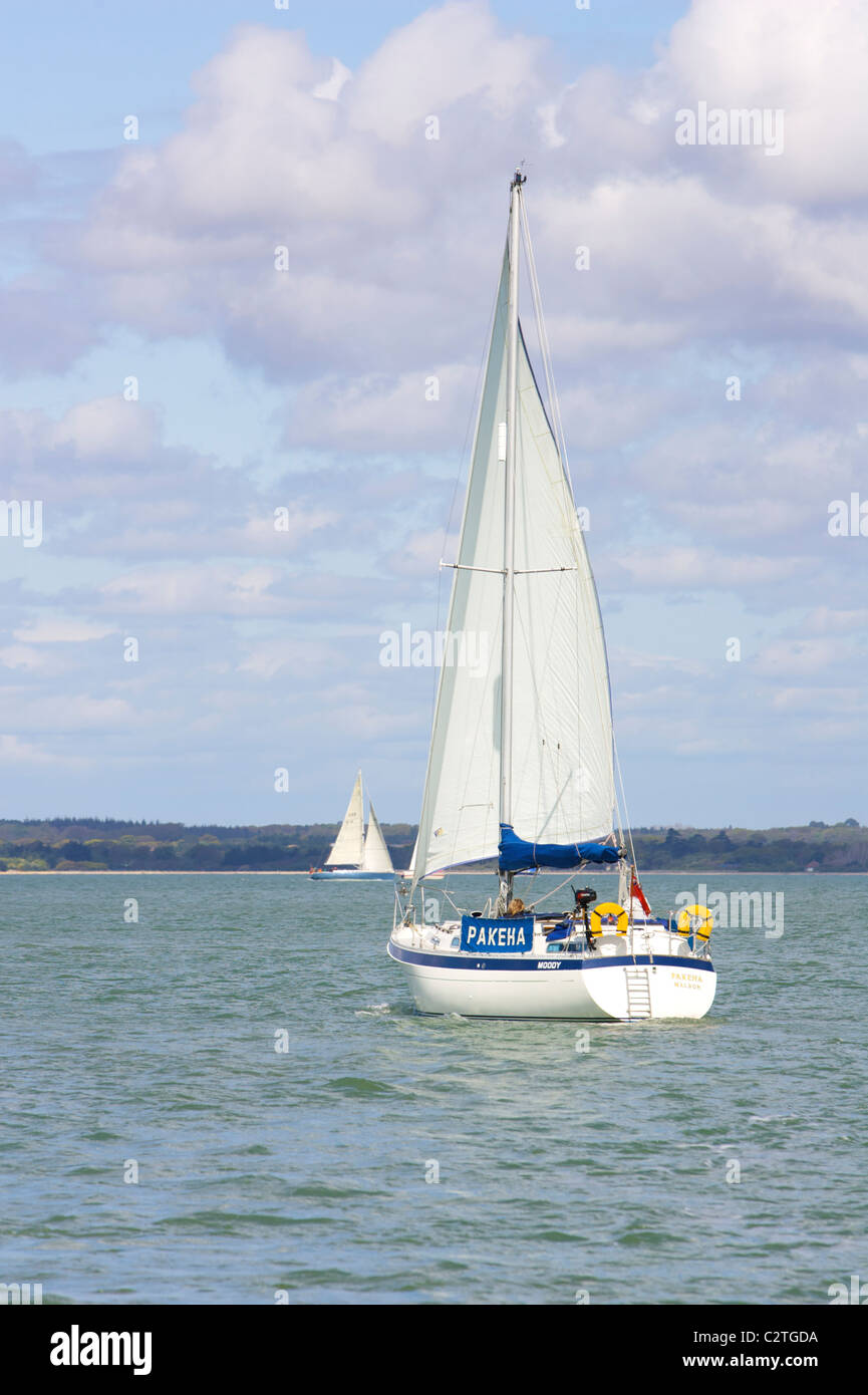 Sailing boat and yachts on the Solent near Lymington Stock Photo - Alamy