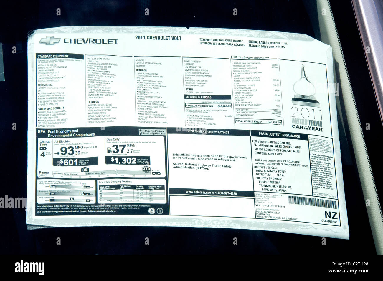 Stickers in the window of a new Chevrolet Volt hybrid gas/electric car ...
