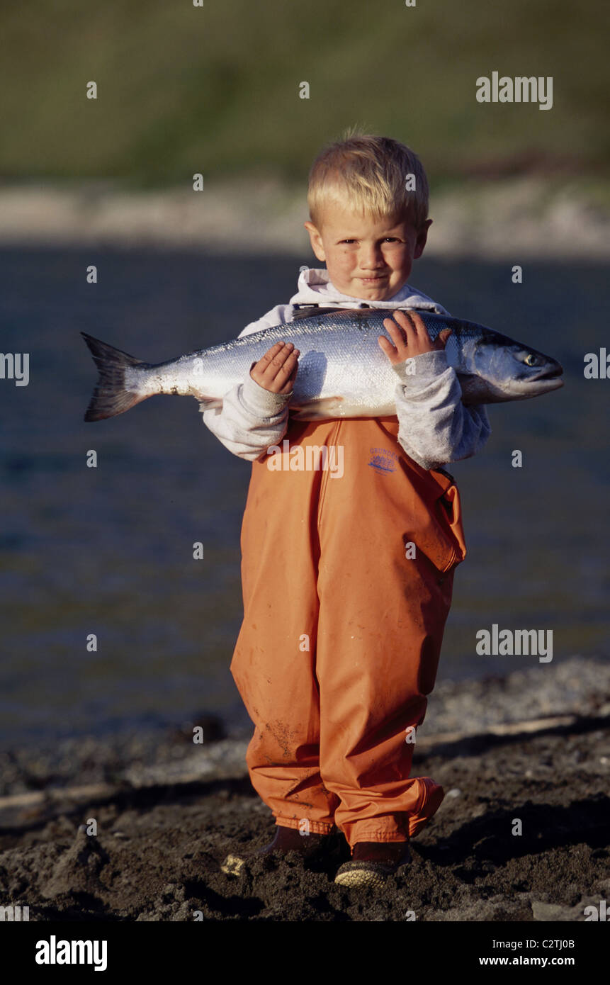 Boy Holding Red Salmon Unalaska AK Stock Photo - Alamy
