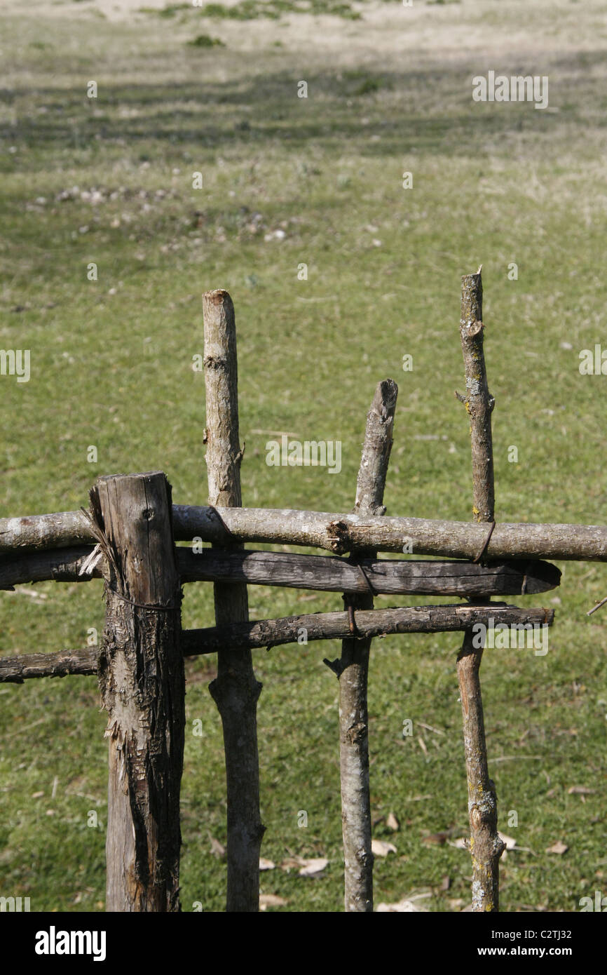 old style fence made with wooden branches sticks Stock Photo - Alamy
