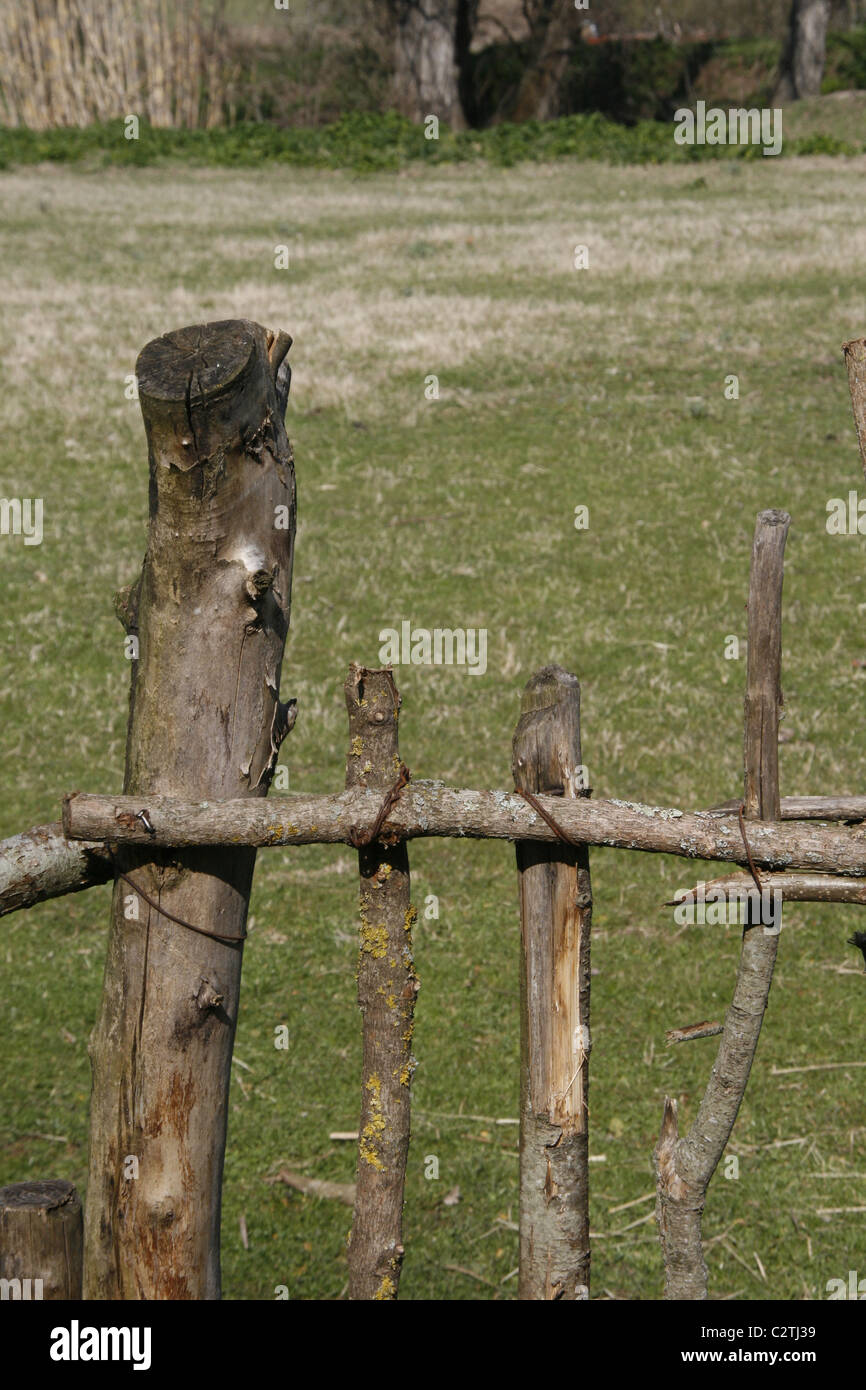 old style fence made with wooden branches sticks Stock Photo - Alamy