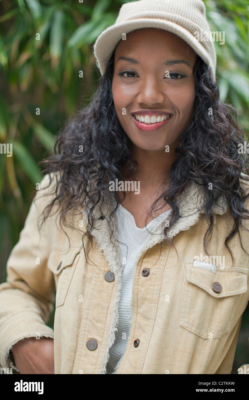 Smiling mixed race woman Stock Photo - Alamy