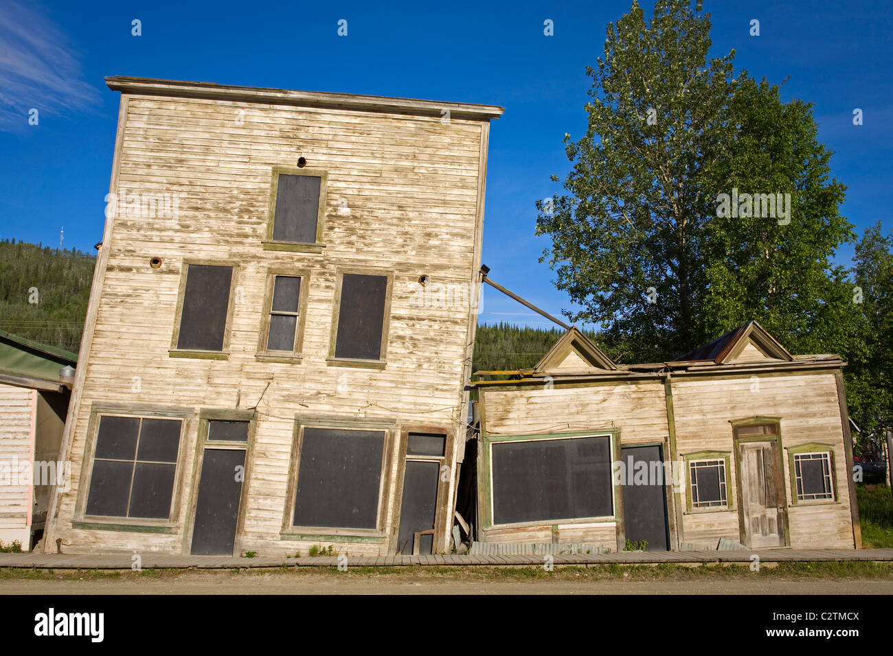 Historic buildings in Dawson City Canada collapsing due to melting ...