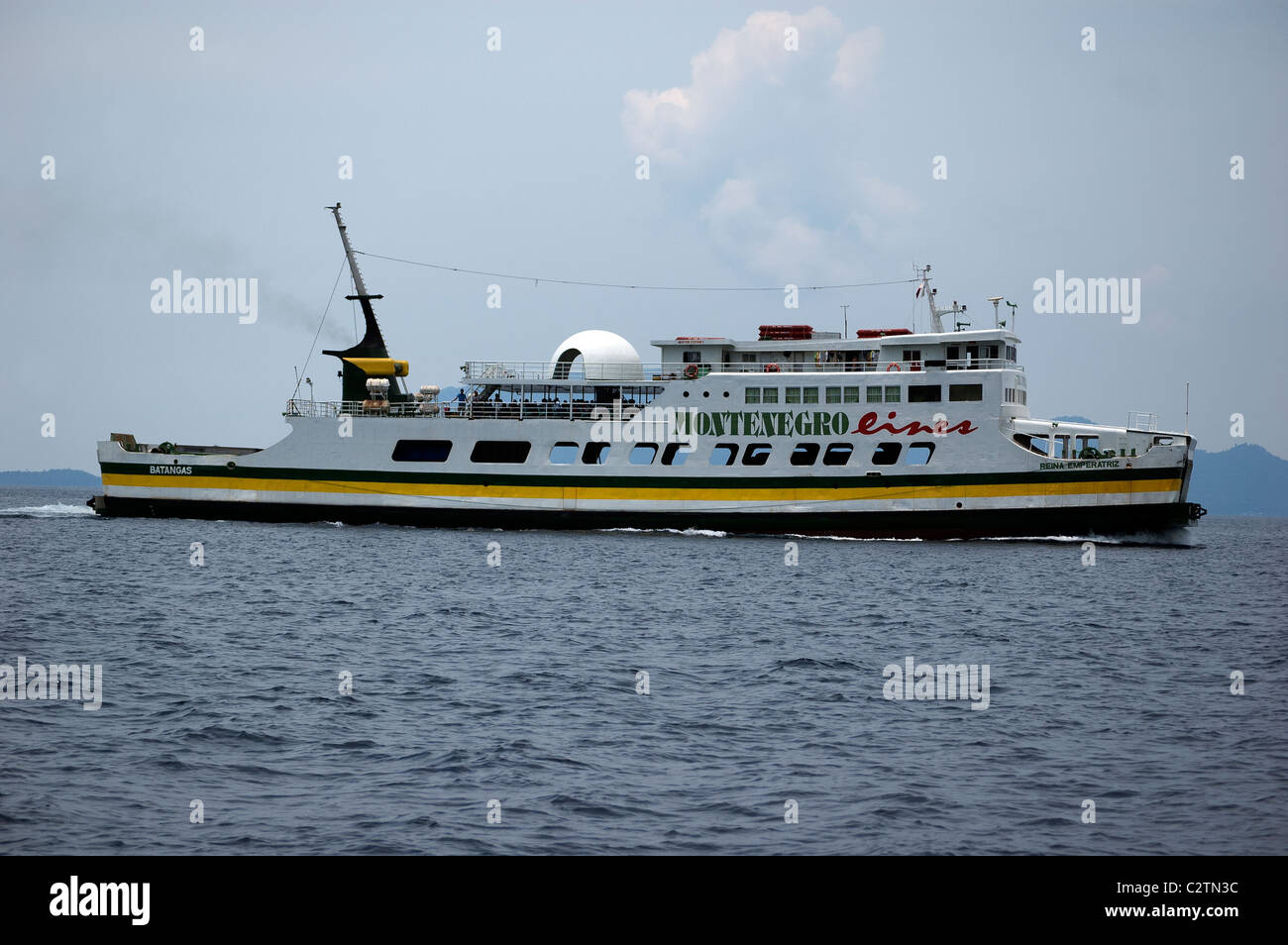 Philippine ferry transports passengers across the seas off Puerto ...