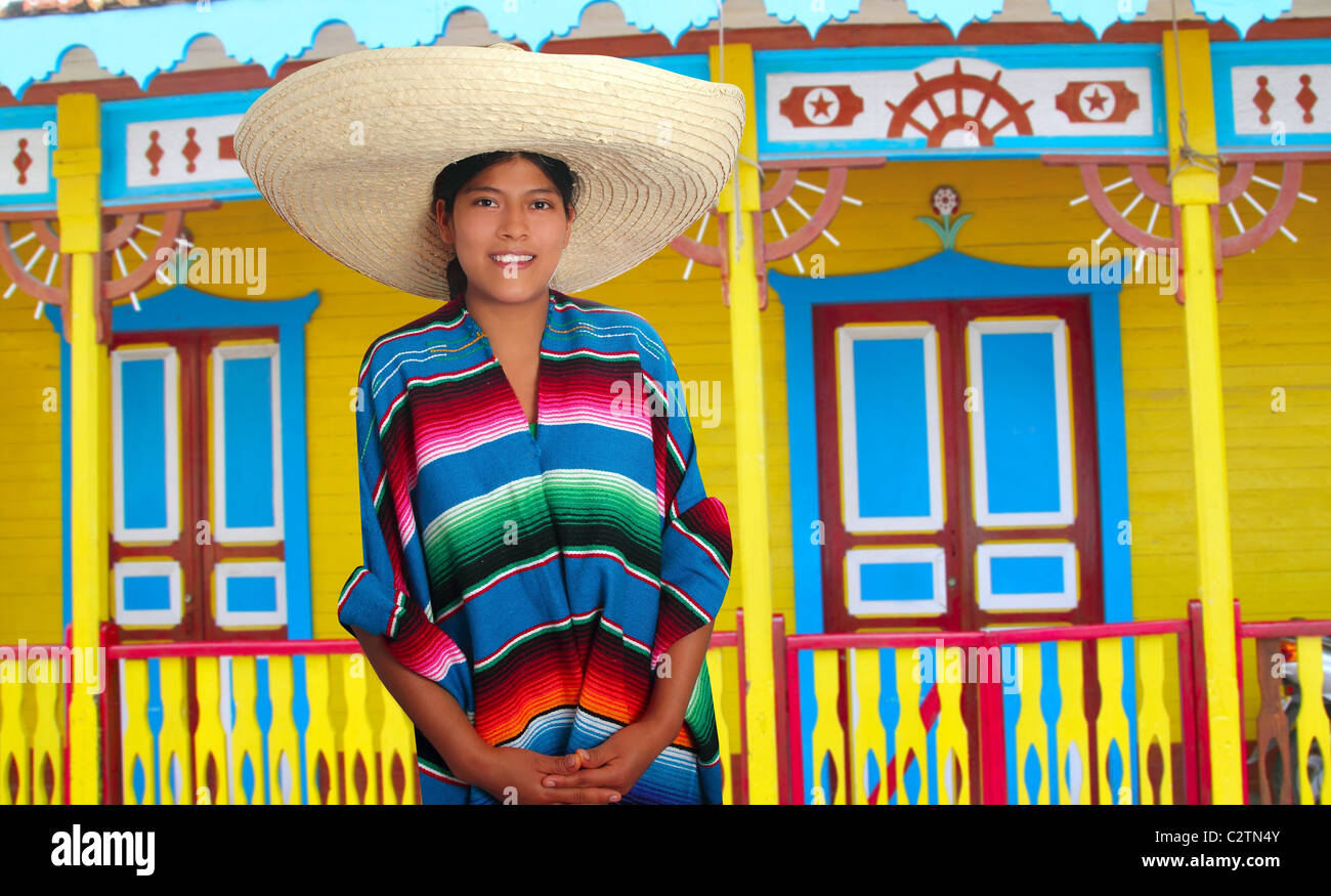 Latin mexican hispanic sombrero poncho woman colorful Mexico houses ...