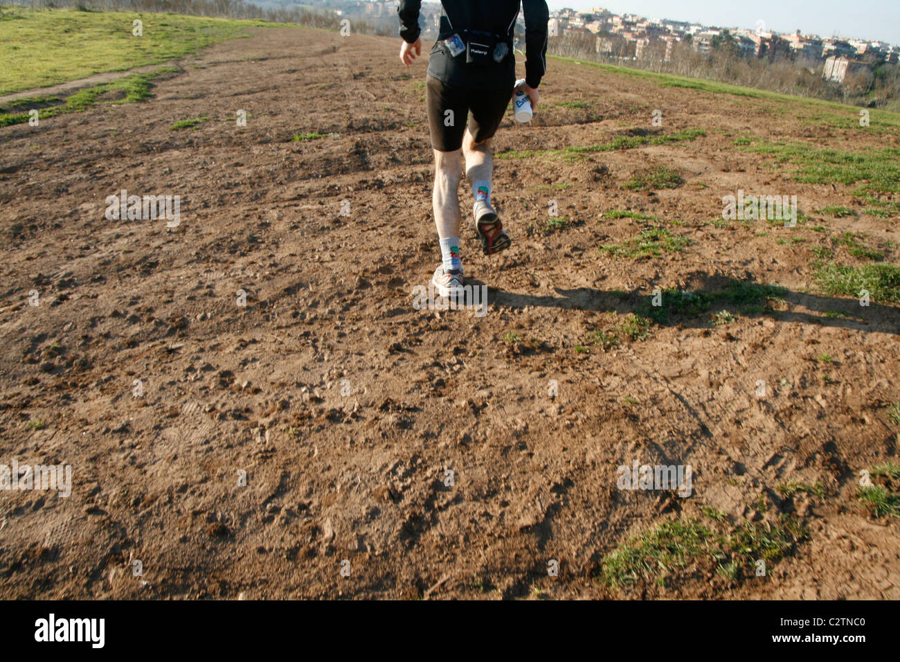 runner in field in countryside Stock Photo - Alamy