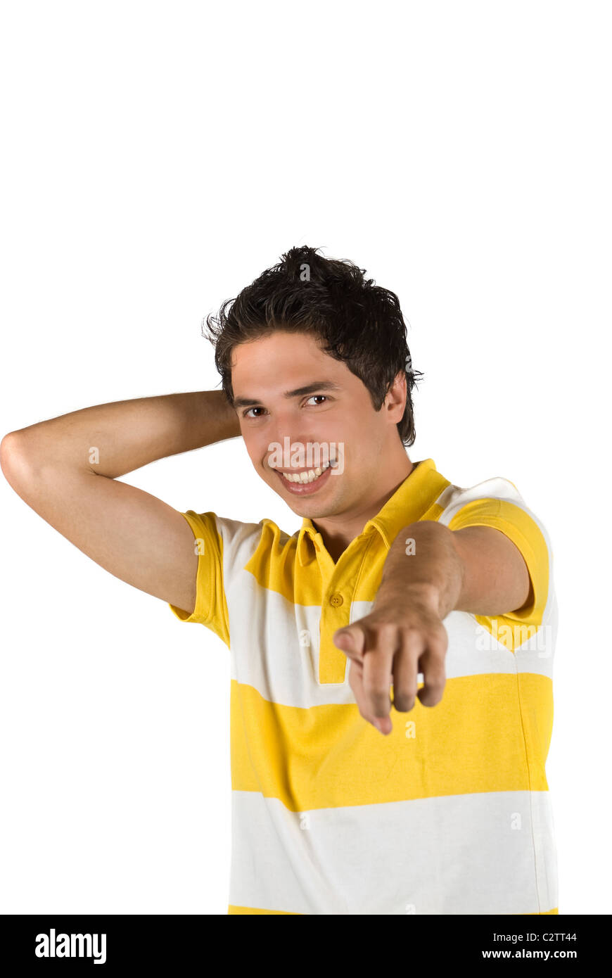 Young attractive male pointing to you with a hand in a cool position ...