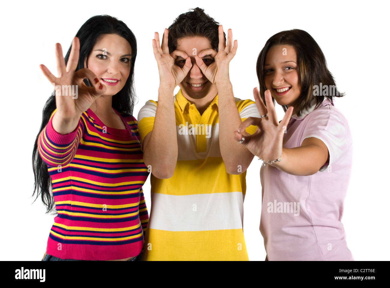 Group of happy friends giving okay sign,the young man with both hands ...
