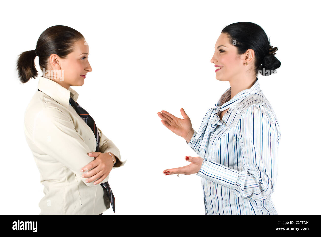Women talking at a show Cut Out Stock Images & Pictures - Alamy