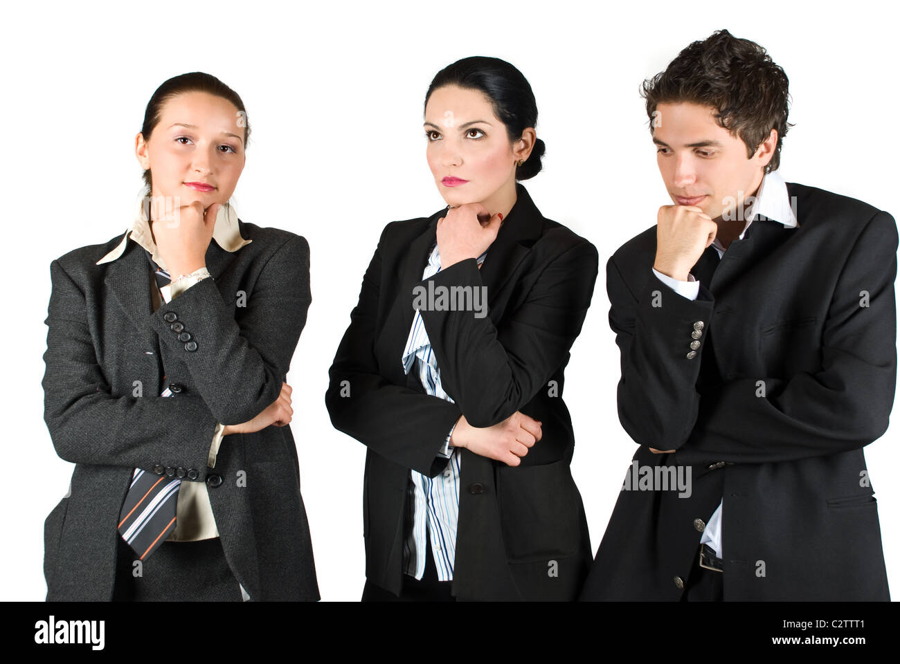 Group of three worried workers standing with hands crossed and thinking ...
