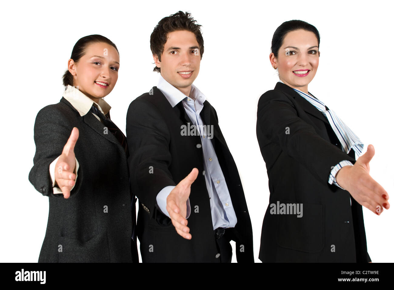 Staff of three business people teamwork standing with hands stretched ...