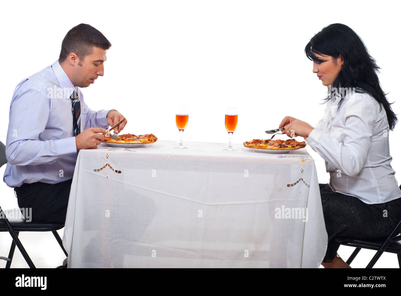 Two People Eating Pizza