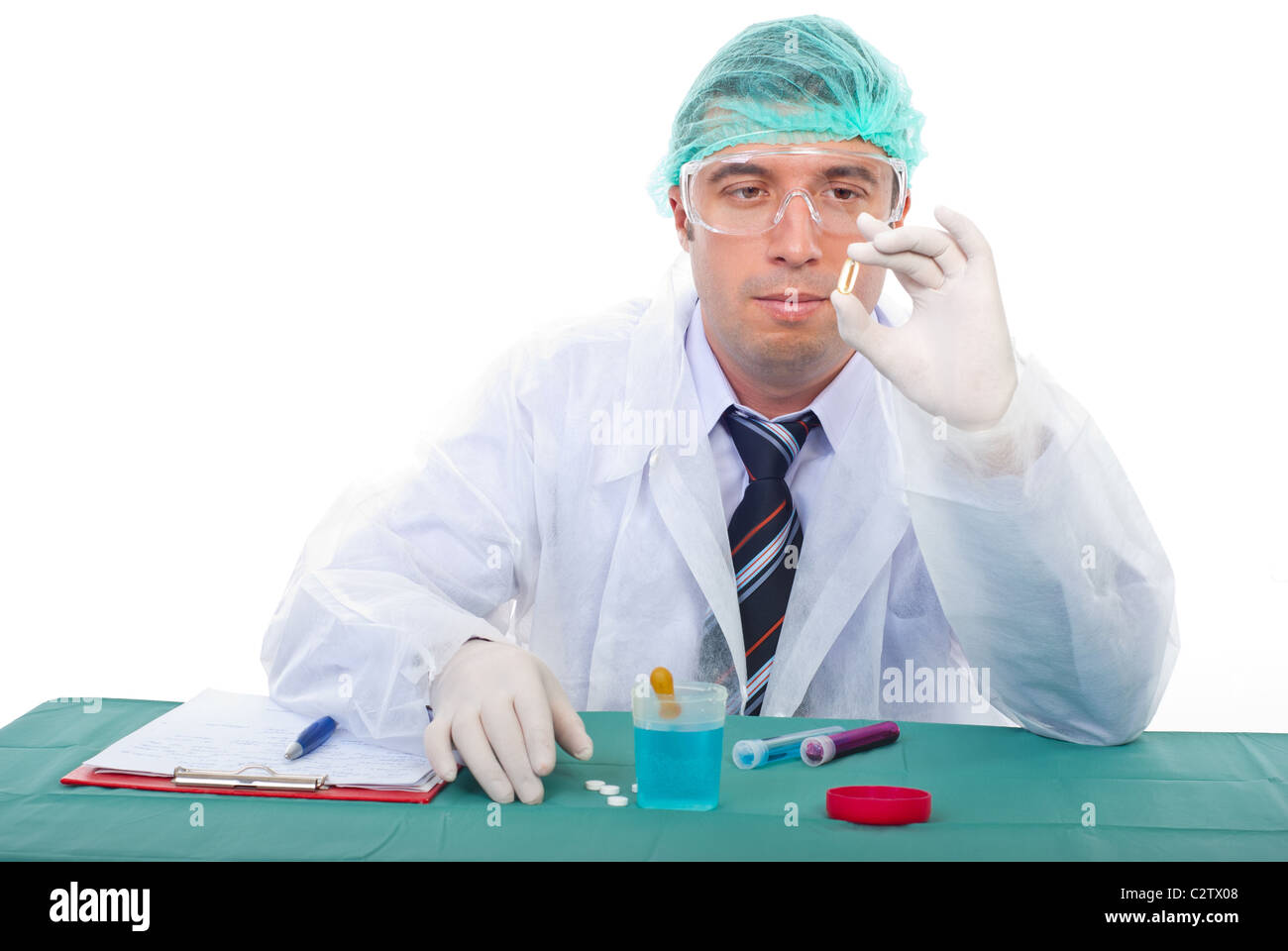 Laboratory man making tests and examine an oil capsule with Omega-3 ...