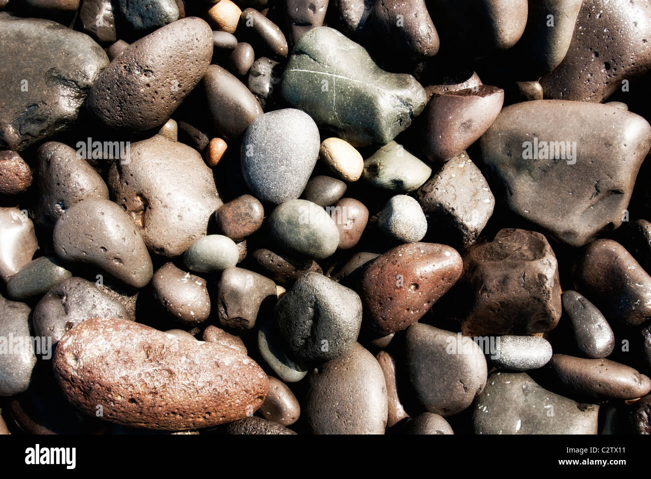 close up of wet pebbles fuerteventura canary islands Stock Photo - Alamy