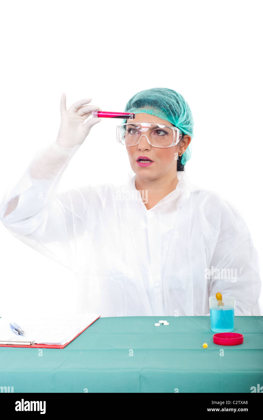 Surprised woman in laboratory examine blood in a tube Stock Photo - Alamy