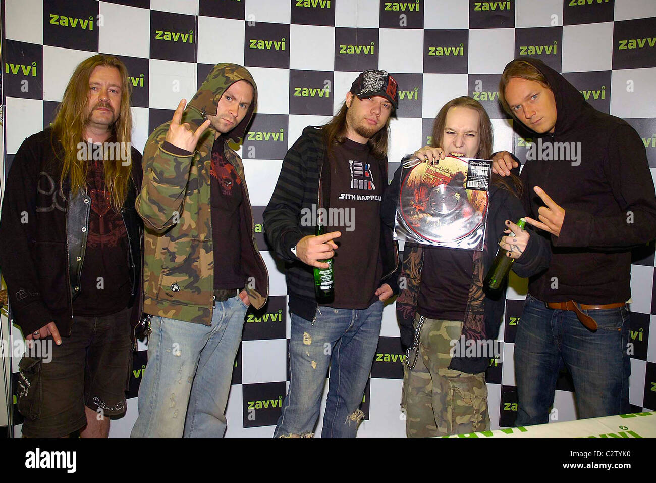 Finish metal band Children of Bodom signs copies of their new single ...