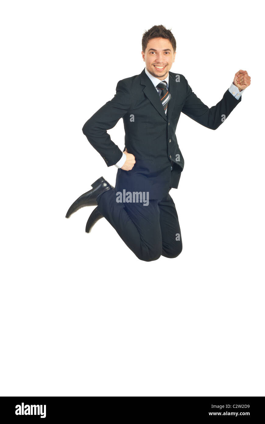 Cheerful business man jumping isolated on white background Stock Photo ...