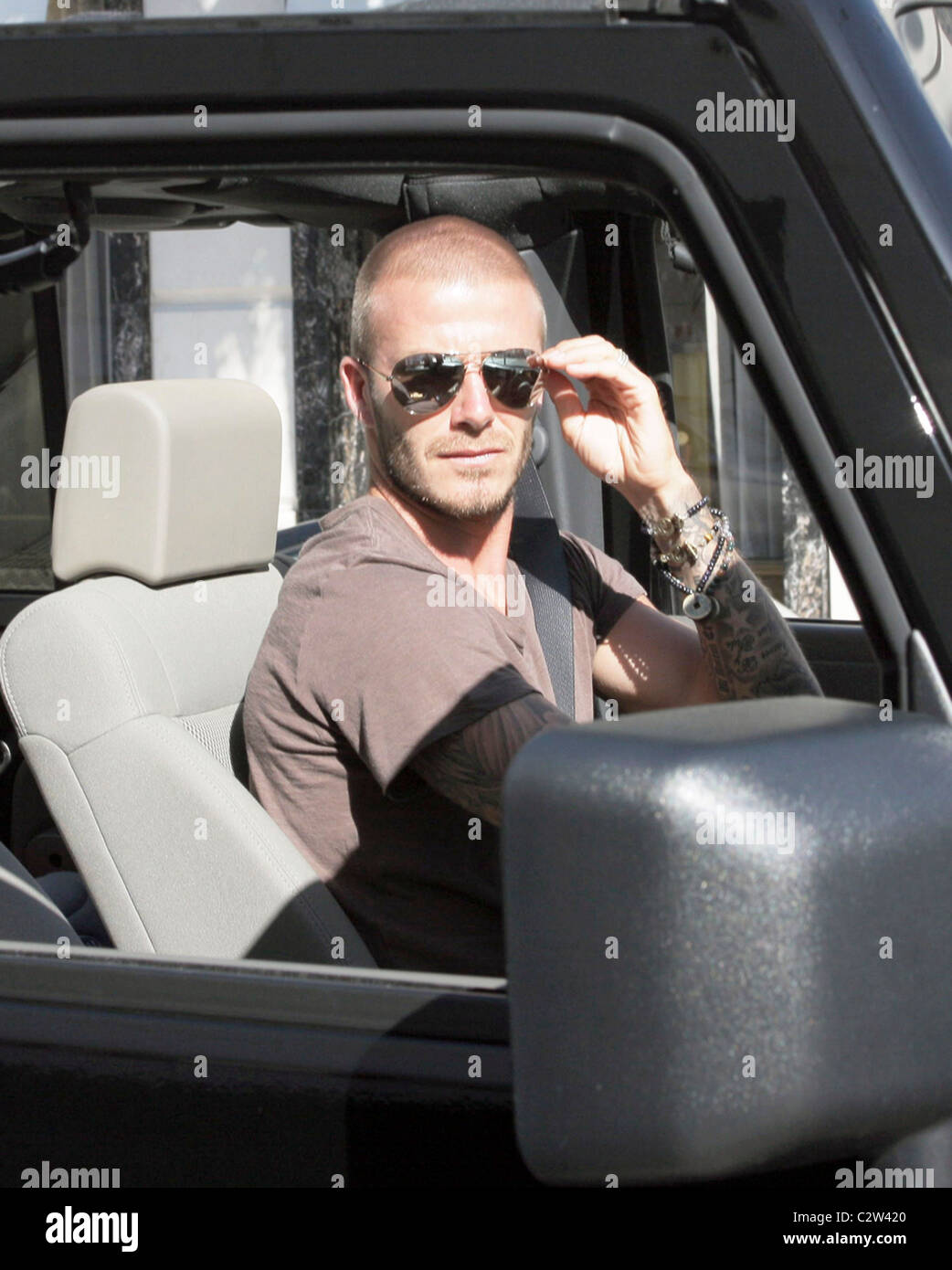 David Beckham drives his custom Jeep through Beverly Hills Los Angeles ...