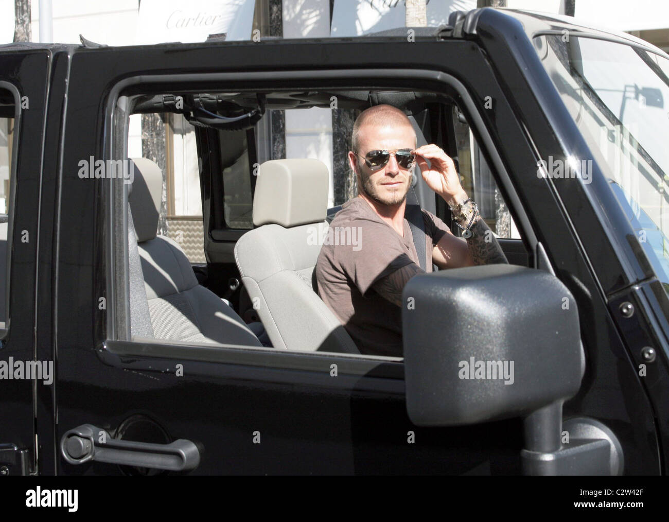 David Beckham drives his custom Jeep through Beverly Hills Los Angeles ...