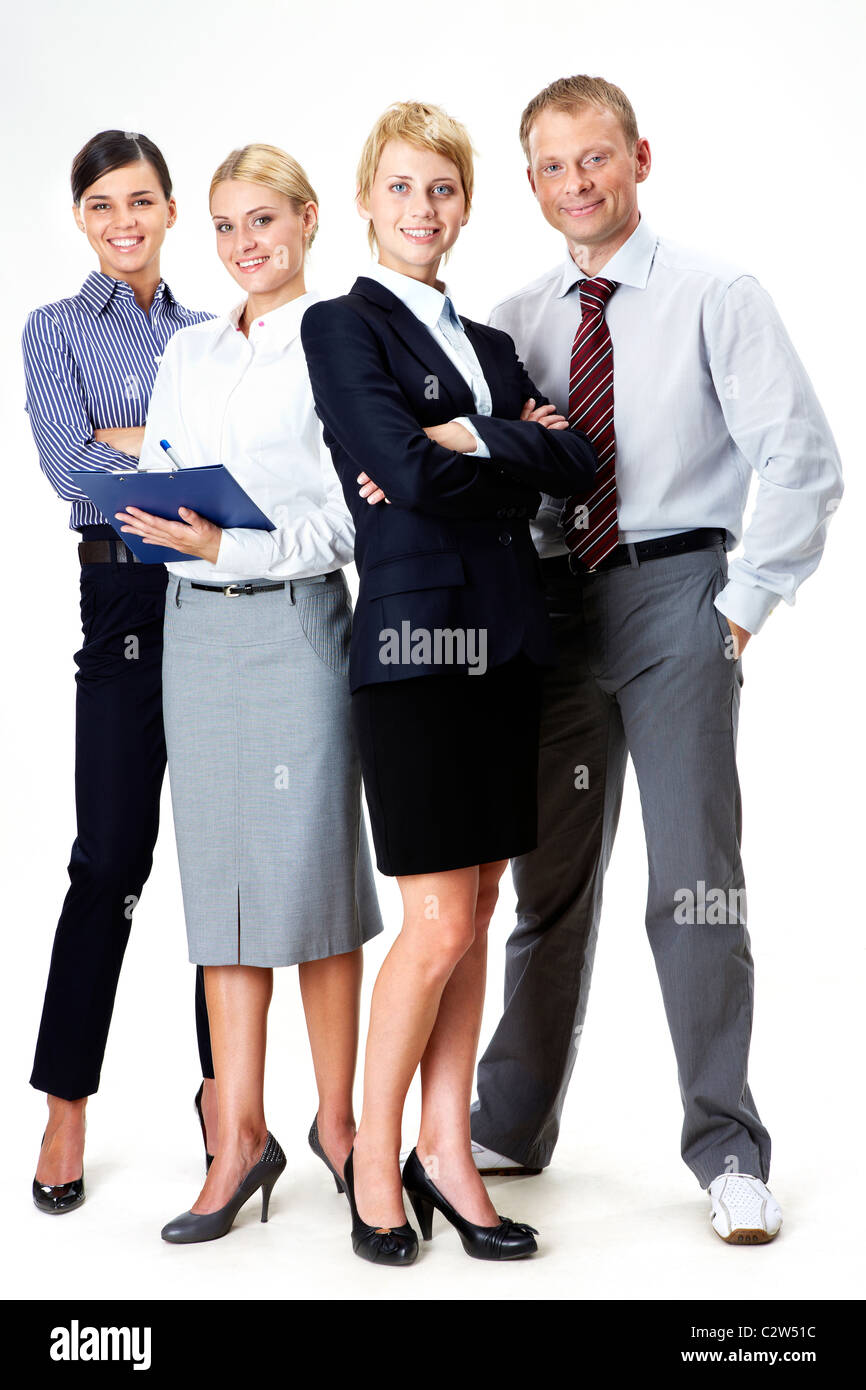 Portrait of friendly business team standing in isolation Stock Photo ...