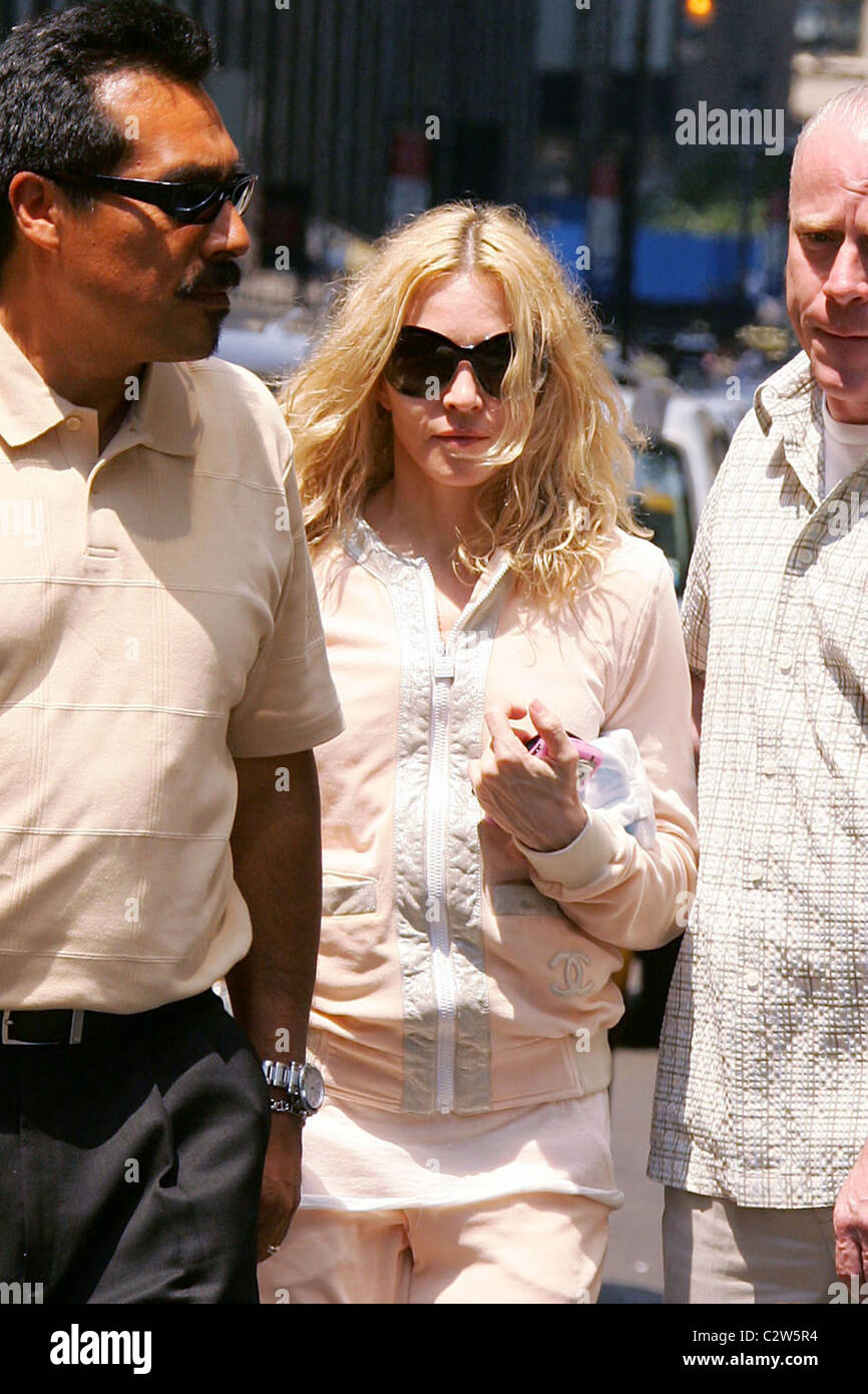 Madonna goes for a walk on the streets of Manhattan accompanied by a ...