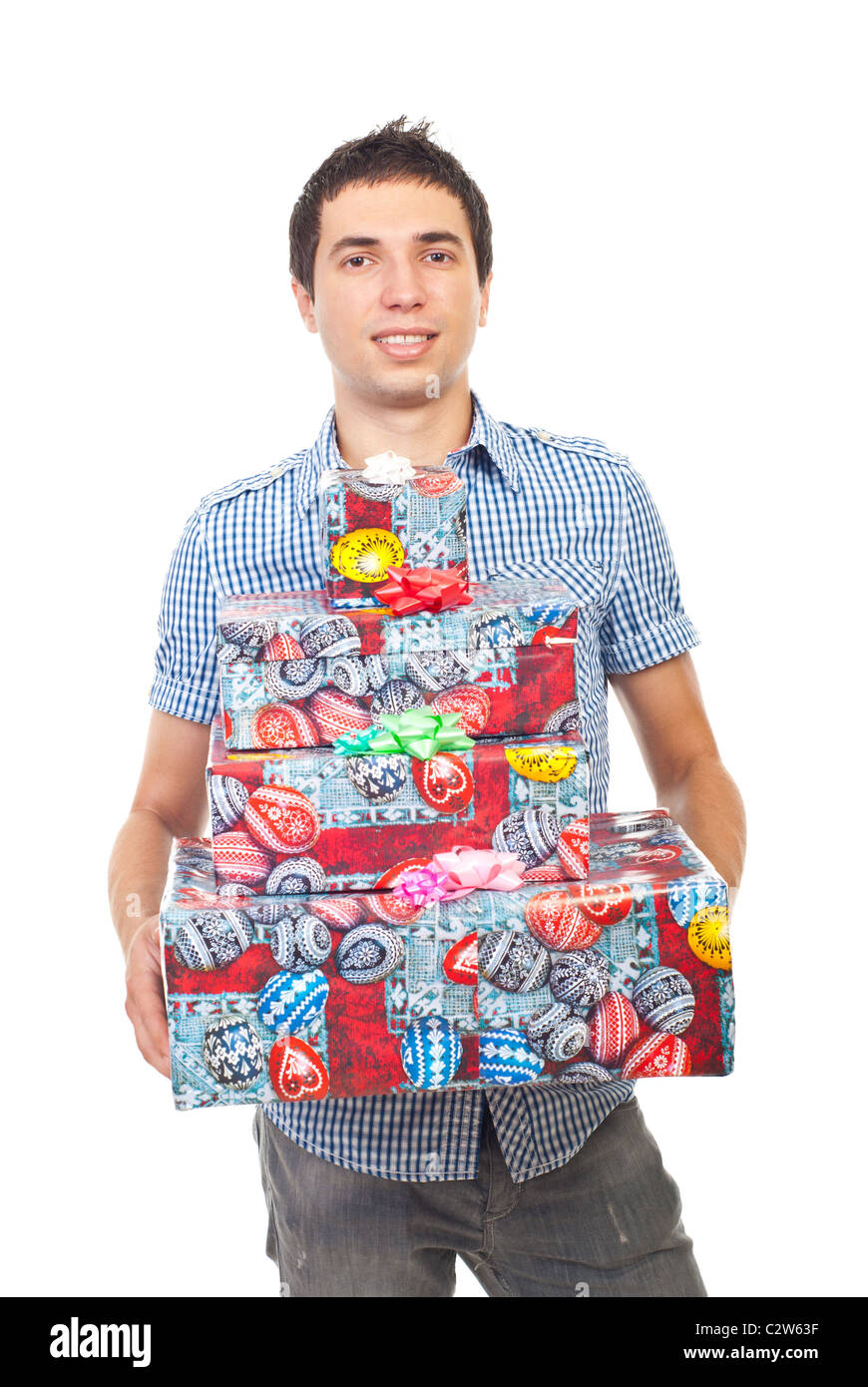 Casual smiling man just bought several presents isolated on white ...