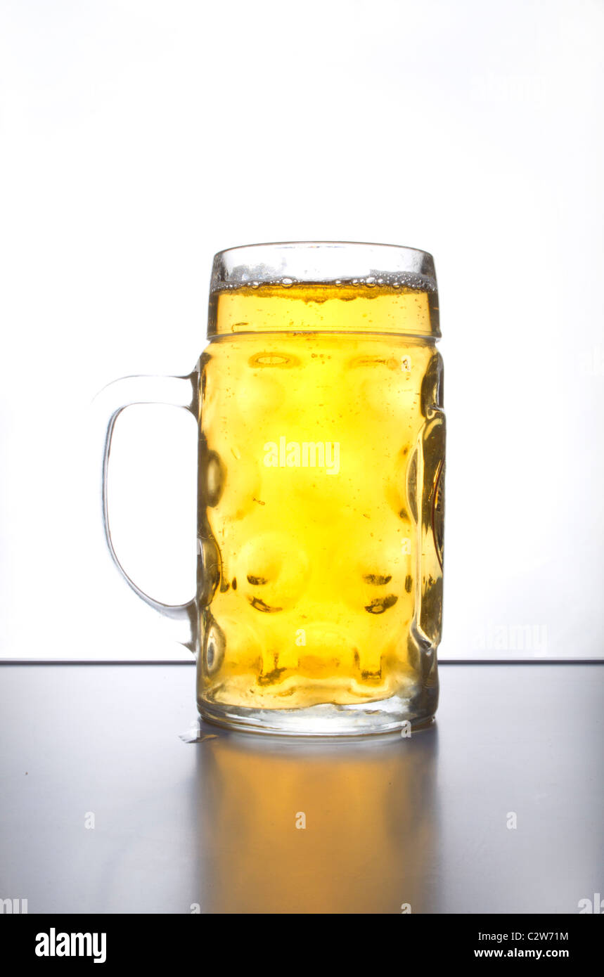Beer mug full of beer Stock Photo - Alamy