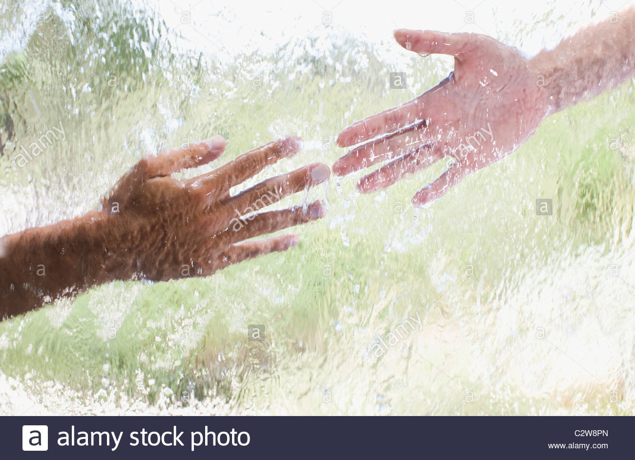 Arm Reaching Out Stock Photos & Arm Reaching Out Stock Images - Alamy
