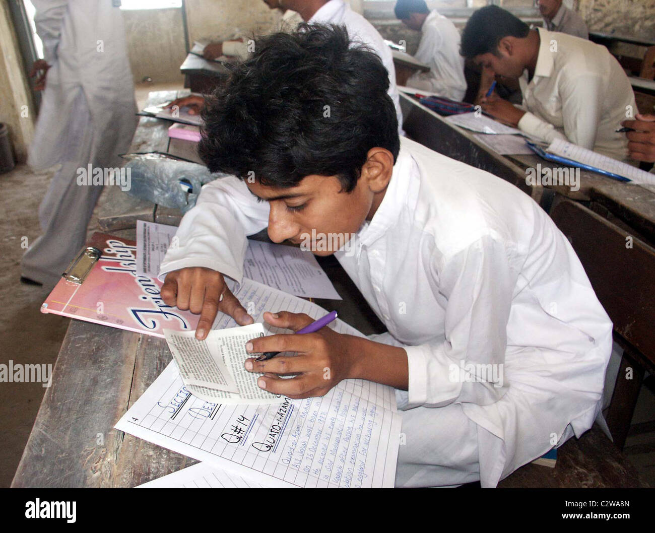 Students copy examination papers hi-res stock photography and images ...