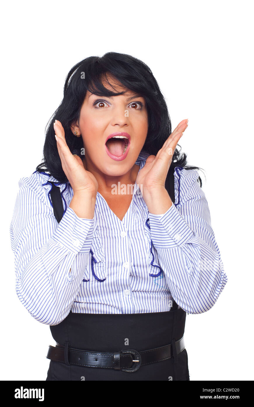 Beautiful surprised woman shouting:Wow! And holding hands up near face ...