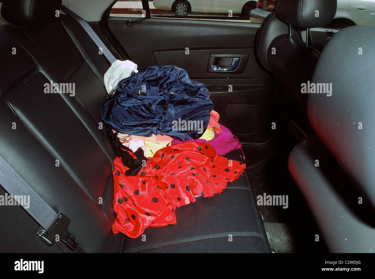 Whitney Port's clothes are scattered inside her parked car as she ...
