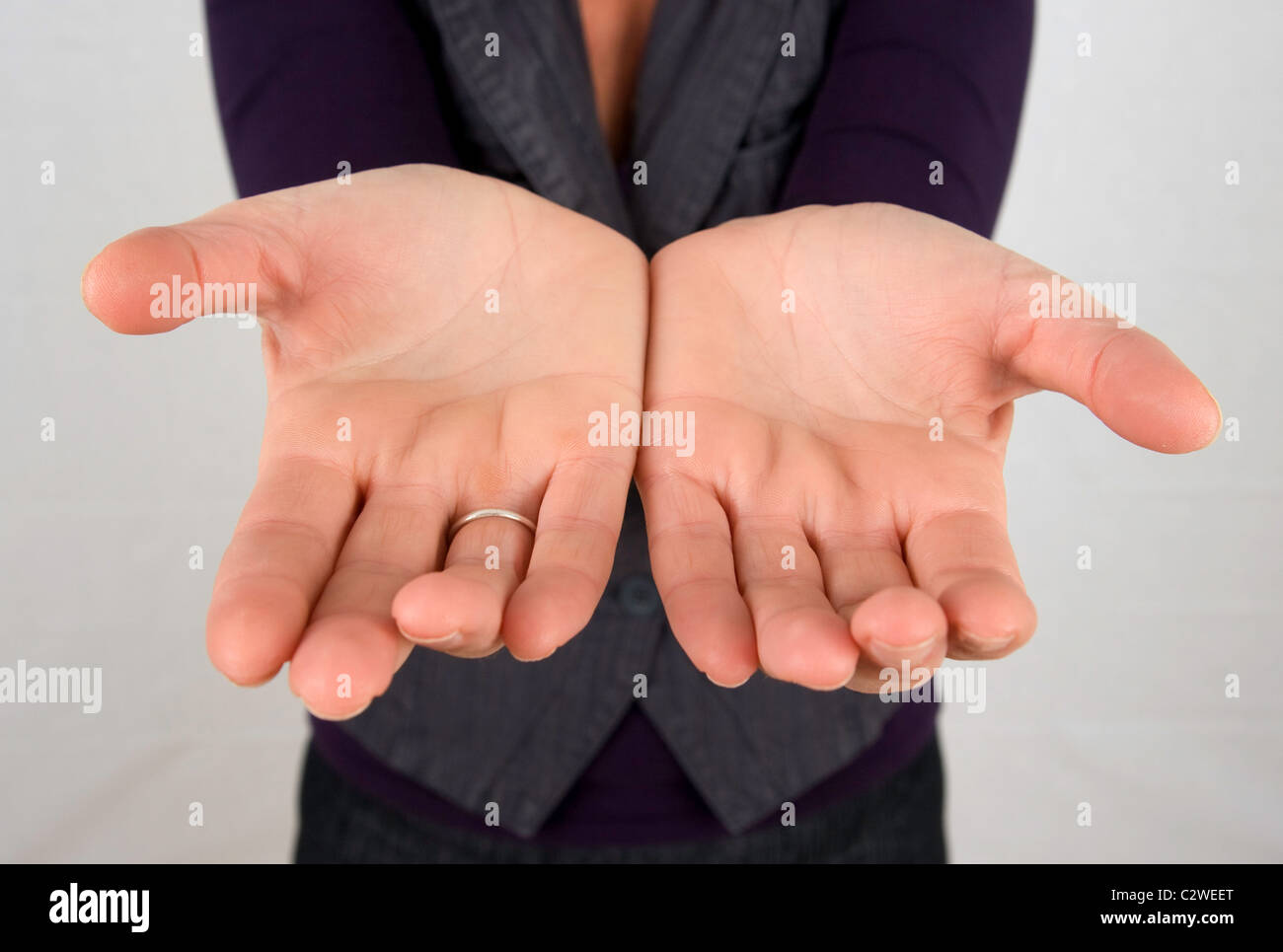 Woman open hands Stock Photo - Alamy